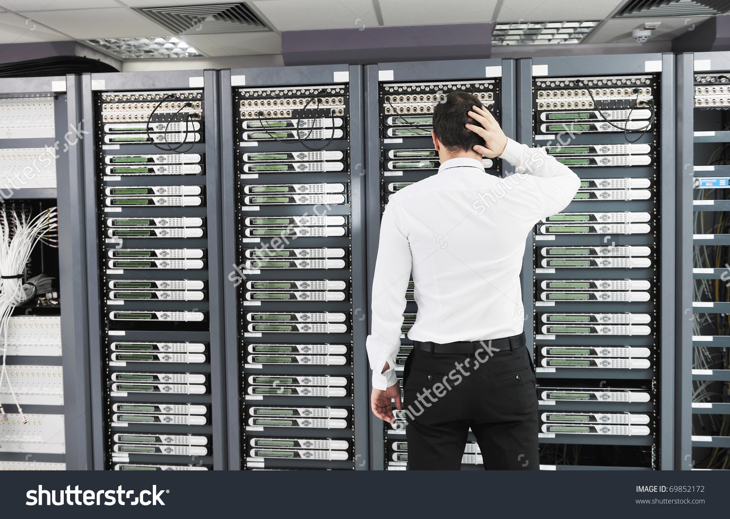 stock-photo-it-business-man-in-network-server-room-have-problems-and ...